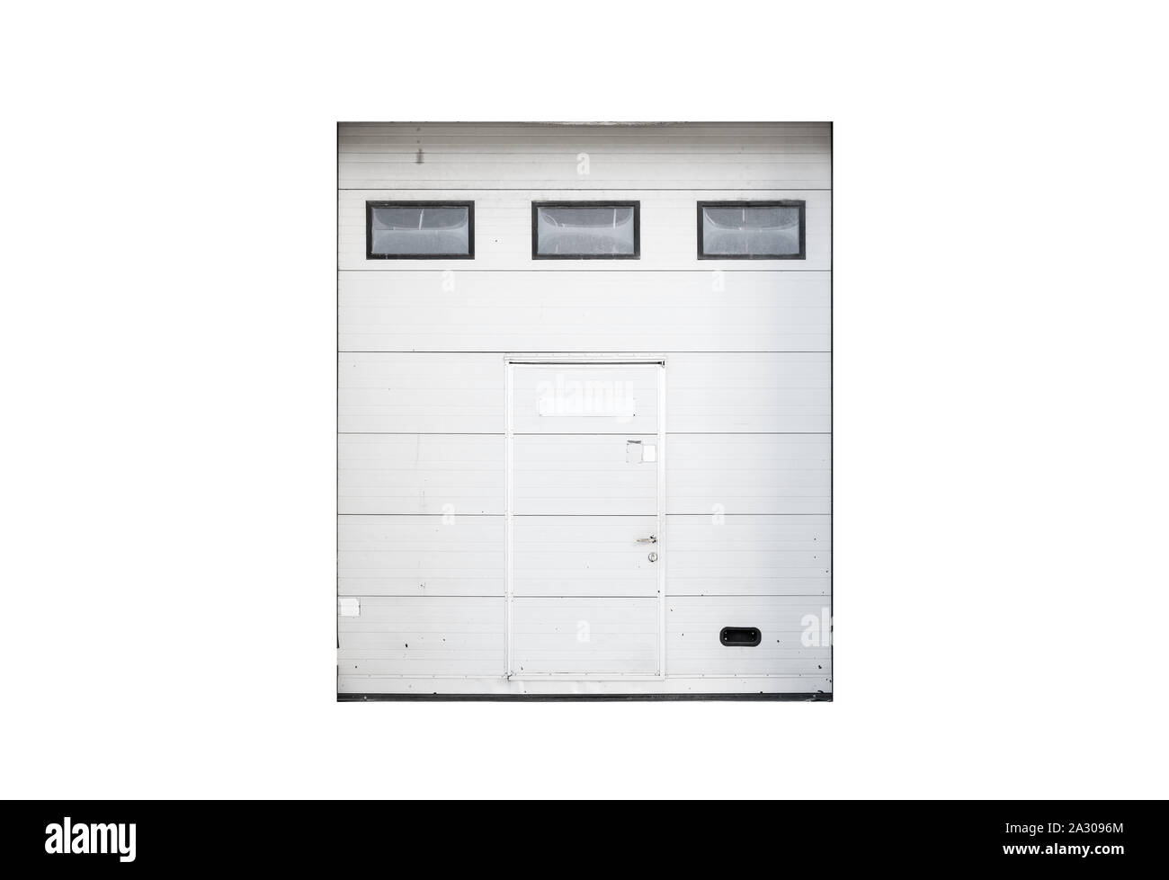 Closed white metal warehouse gate with small windows isolated on white ...