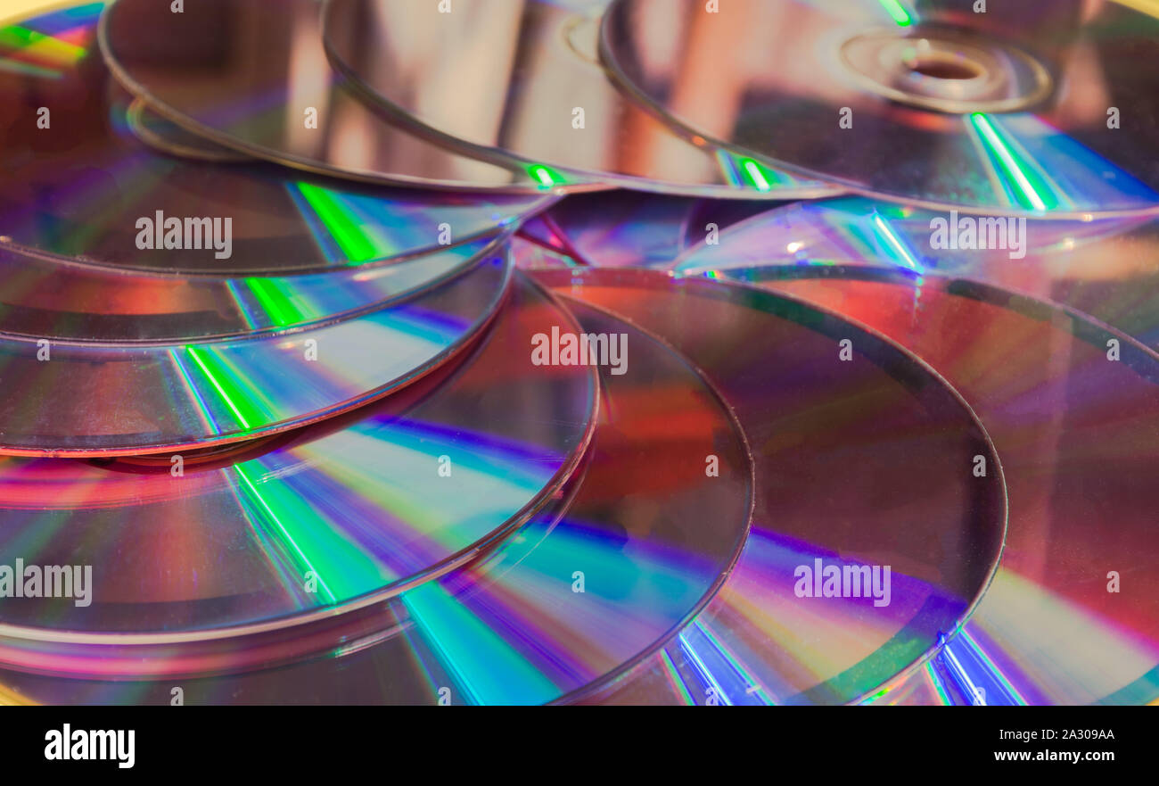 Shiny cd disk pattern. Creative composition with compact computer disks ...