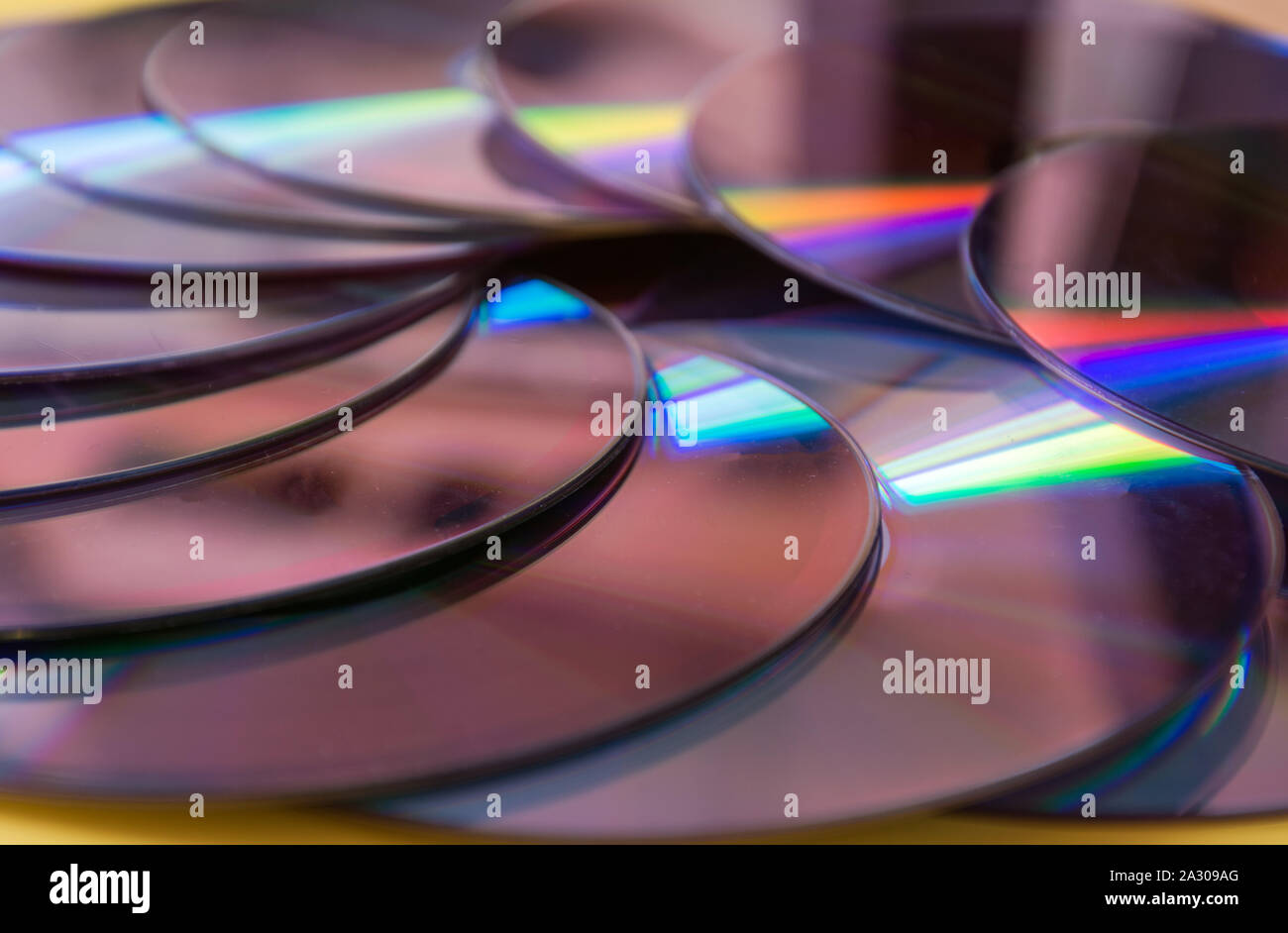 Shiny cd disk pattern. Creative composition with compact computer disks ...