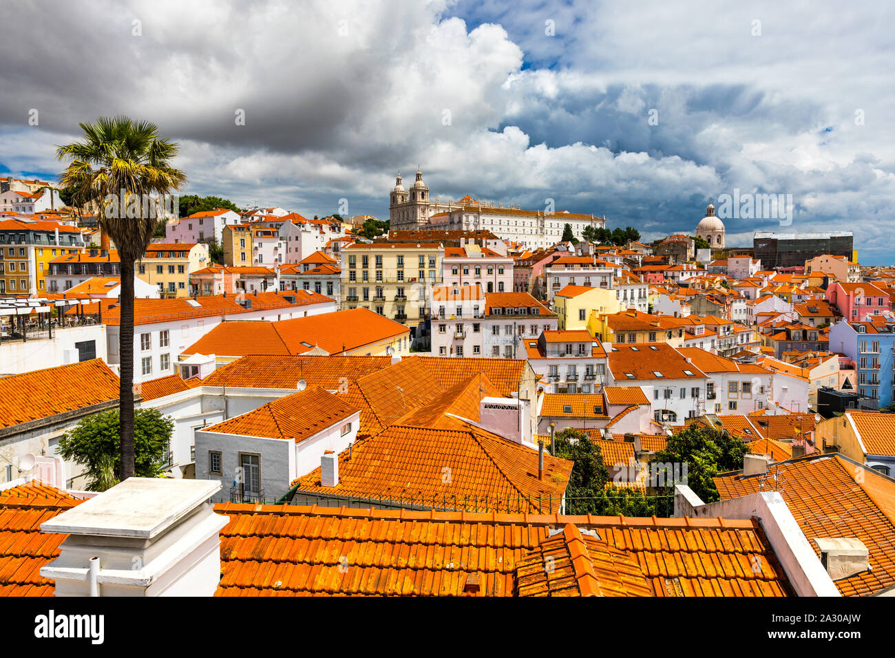 Lisbon, Portugal city skyline over the Alfama district. Summertime ...