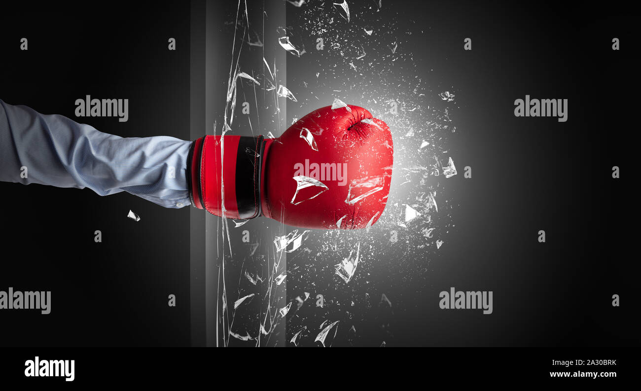 Big hand hits intense and breaks glasses Stock Photo - Alamy