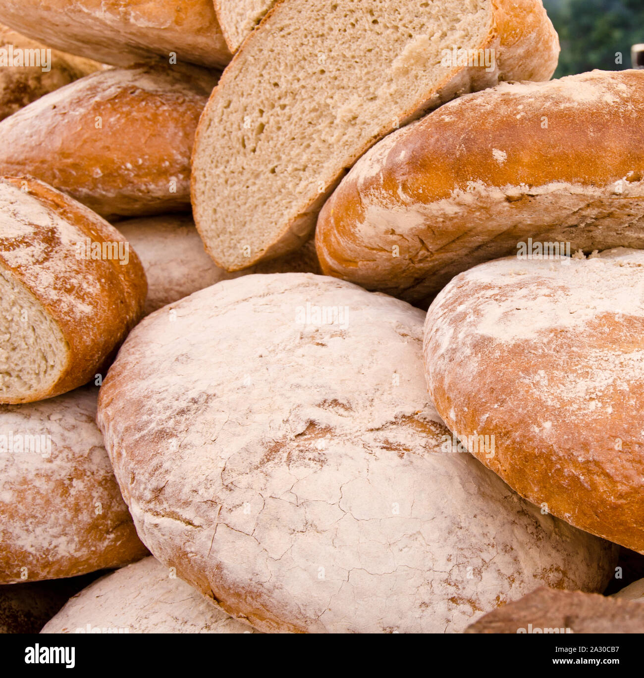A large loaf of bread at a market table, rustic agriculture Stock Photo ...