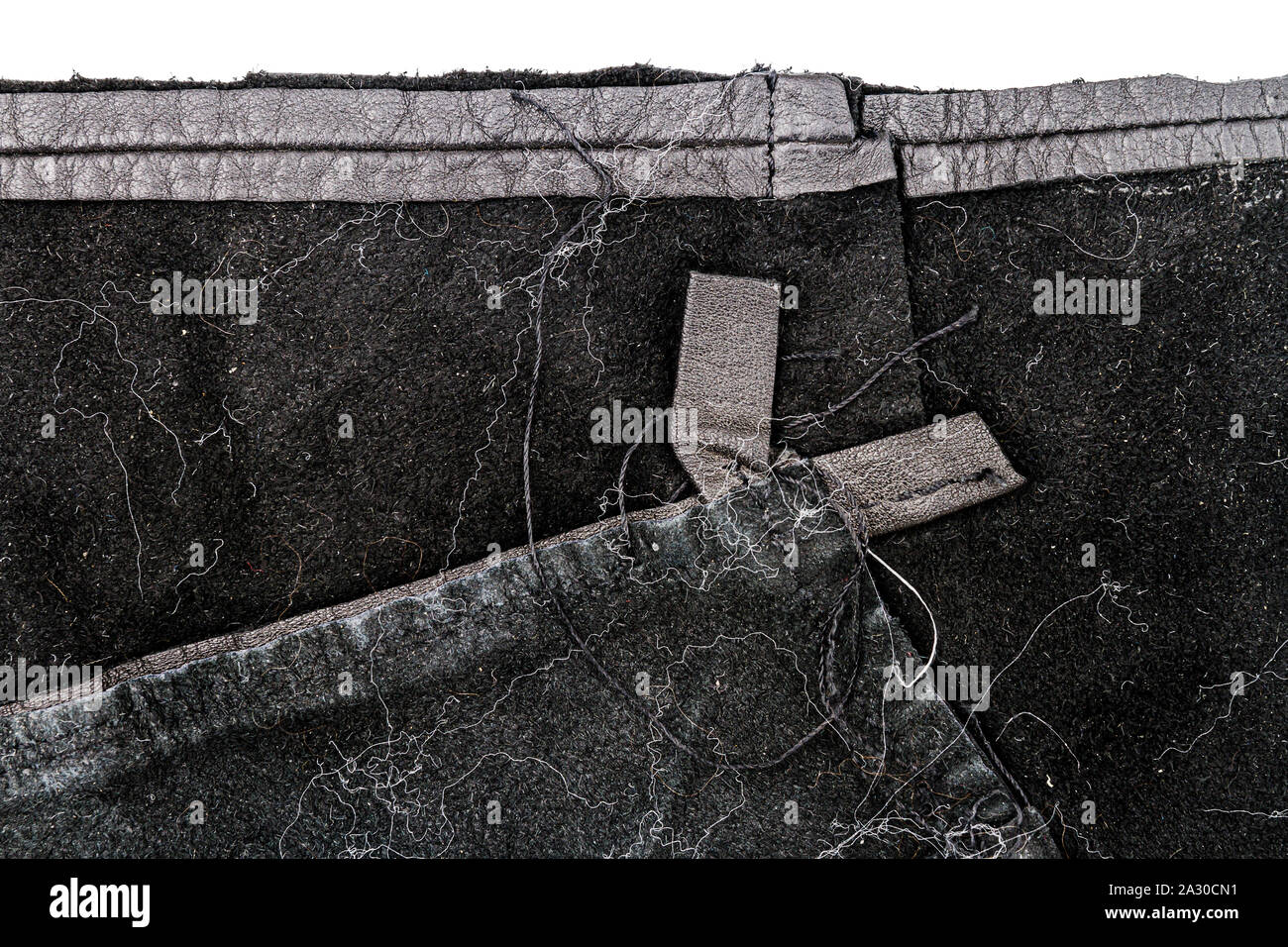Piece of messy black leather isolated on white background. Crumpled ...