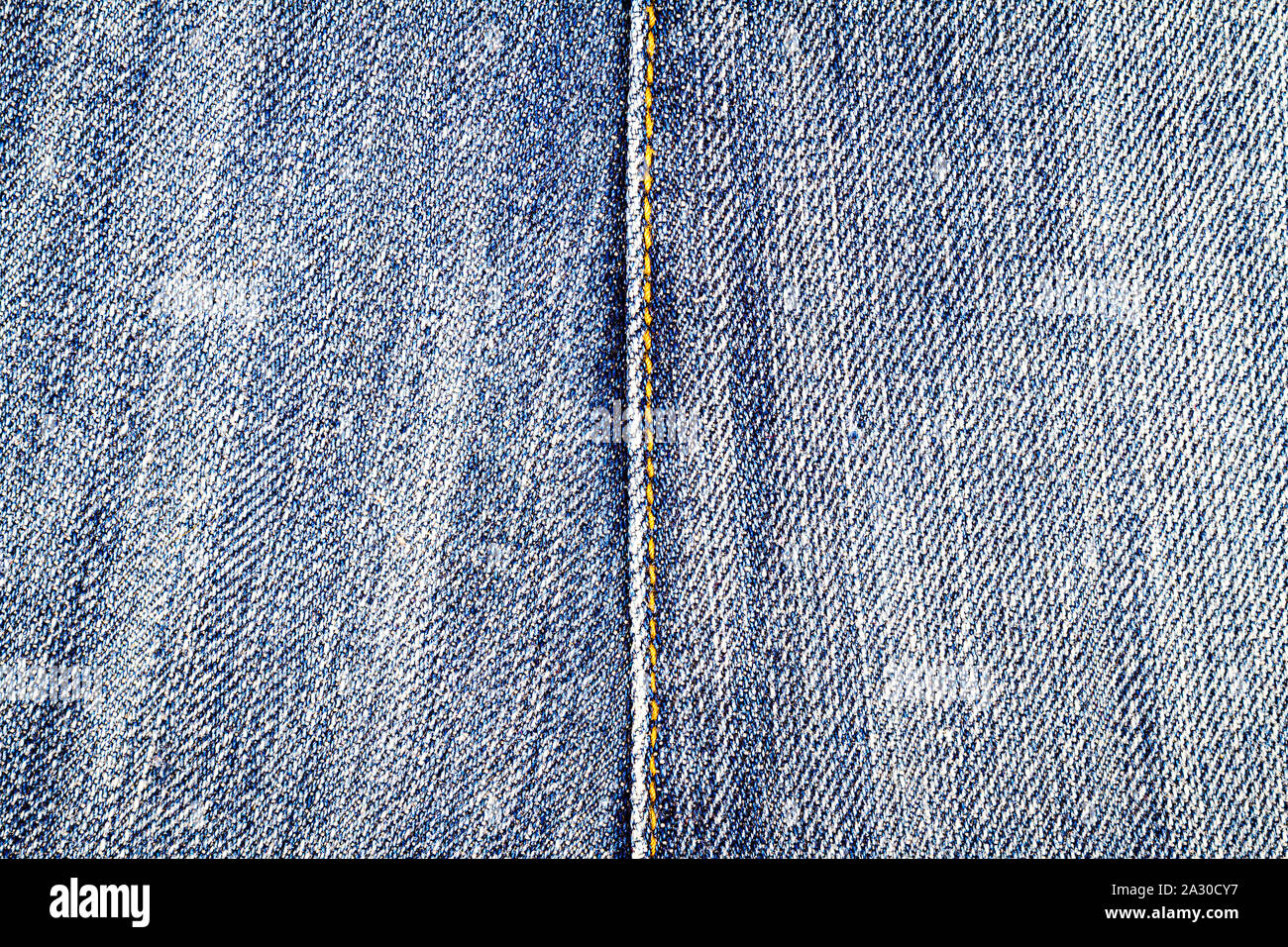 Light blue jeans texture. Denim fabric background with a seam Stock ...