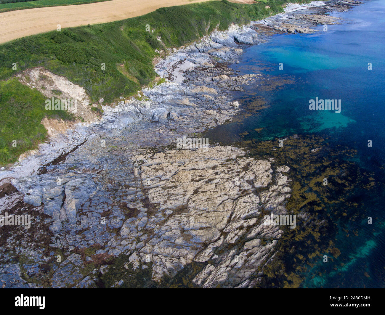 Rocks along the South West coast path in Cornwall by drone Stock Photo ...