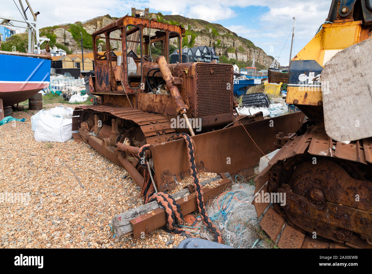 Rusty bulldozers and junk at Hastings Stock Photo - Alamy