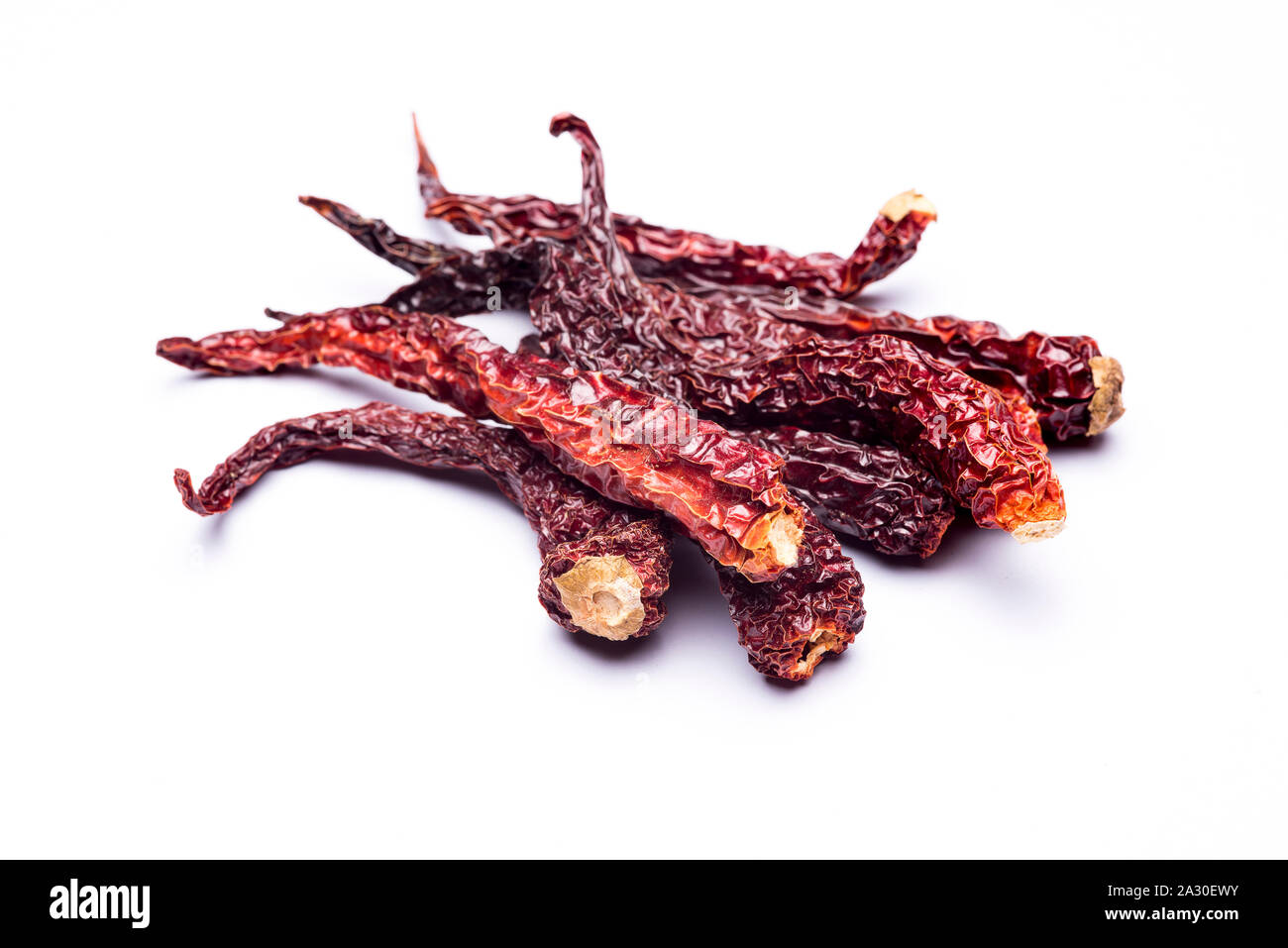 Kashmir dry chillies in isolated white background Stock Photo - Alamy