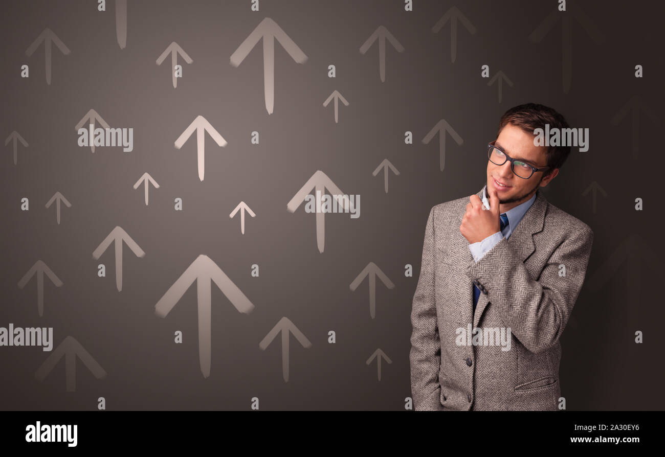 Young person thinking with direction concept background Stock Photo - Alamy