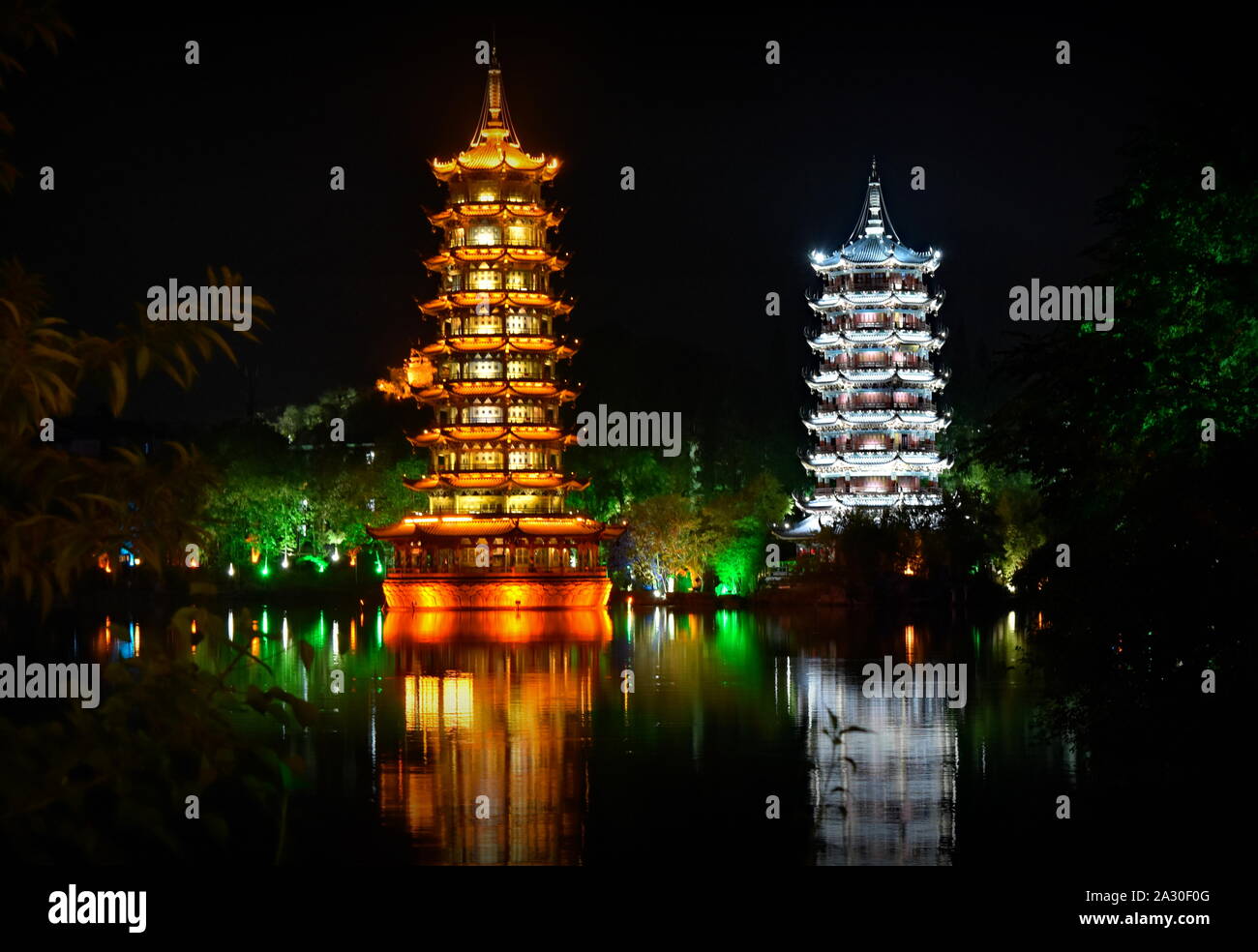 Floating Sun and Moon pagodas and park in Guilin at night, China Stock ...