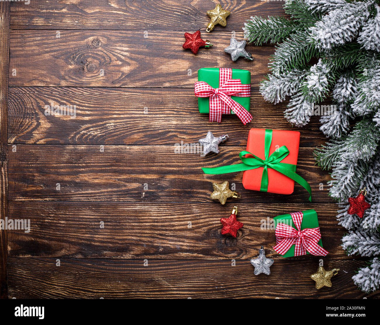 Christmas gift boxes and tree Stock Photo - Alamy