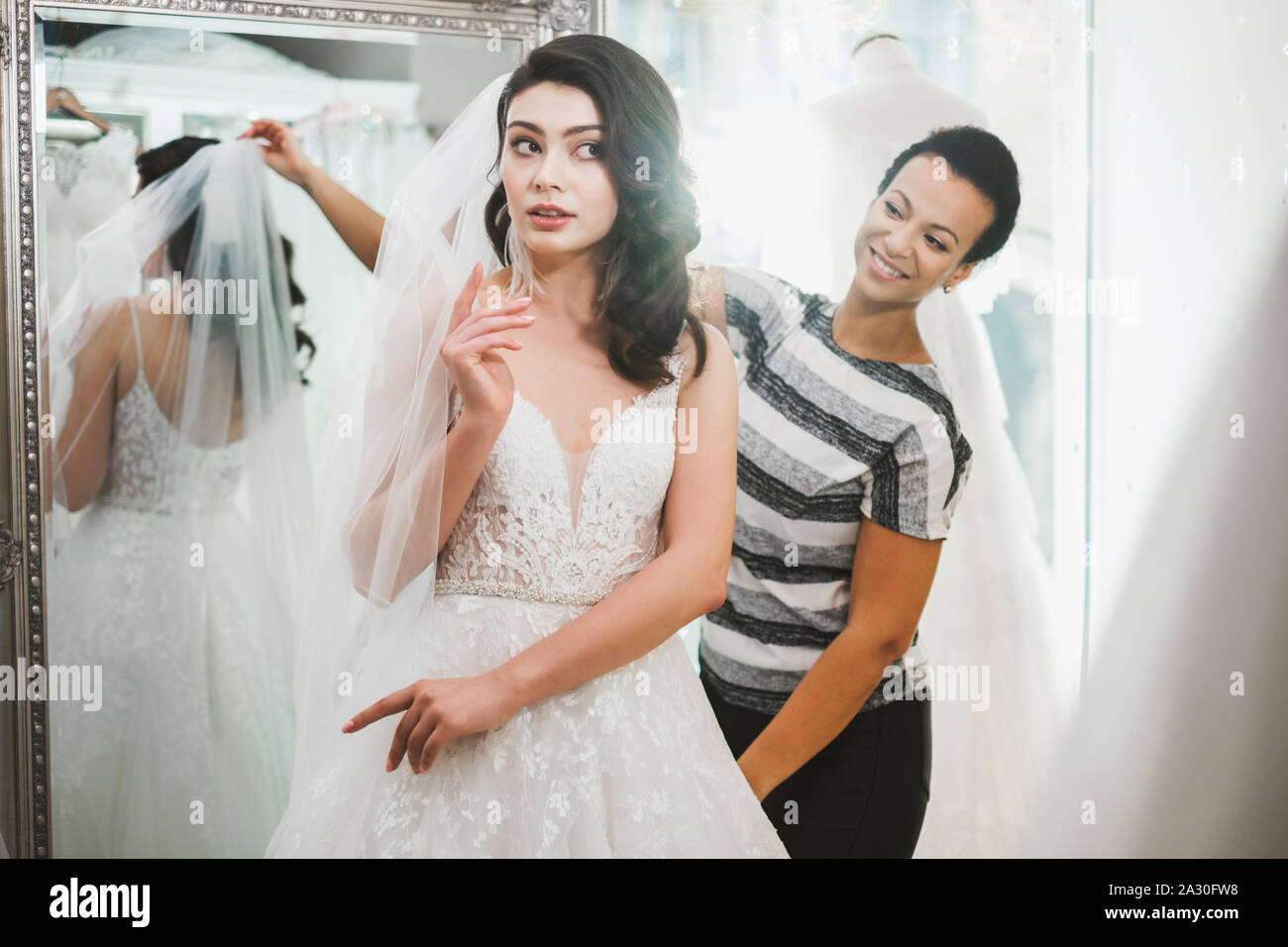 Beautiful girl choosing wedding hi-res stock photography and images - Alamy