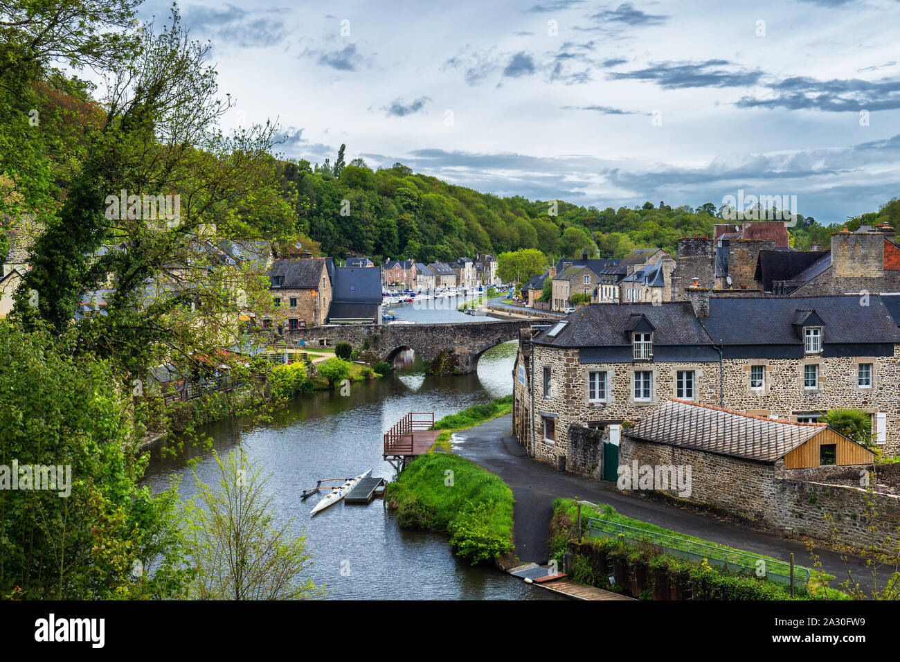 The picturesque medieval port of Dinan on the Rance Estuary, Brittany ...