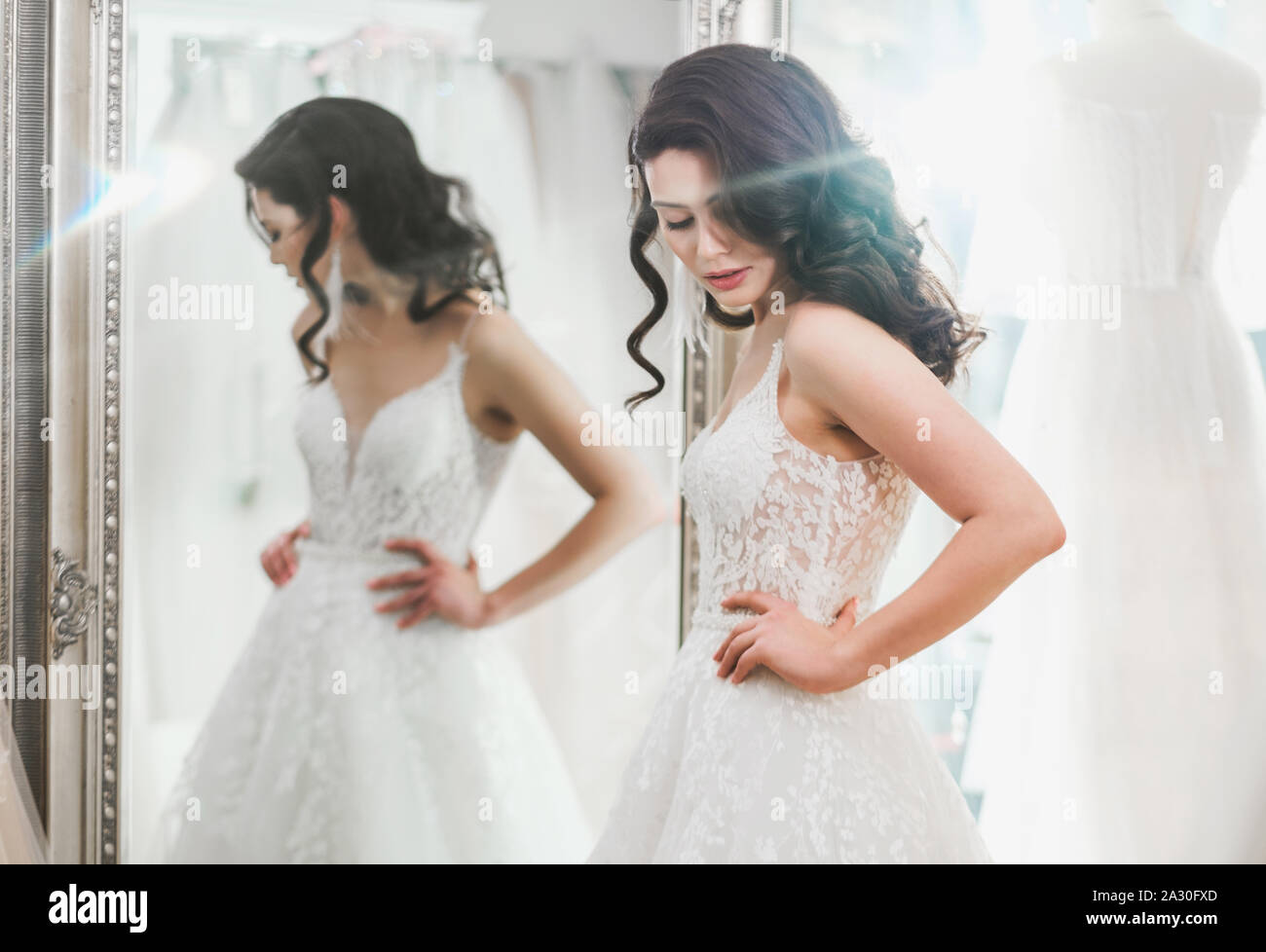 Beautiful girl choosing wedding hi-res stock photography and images - Alamy