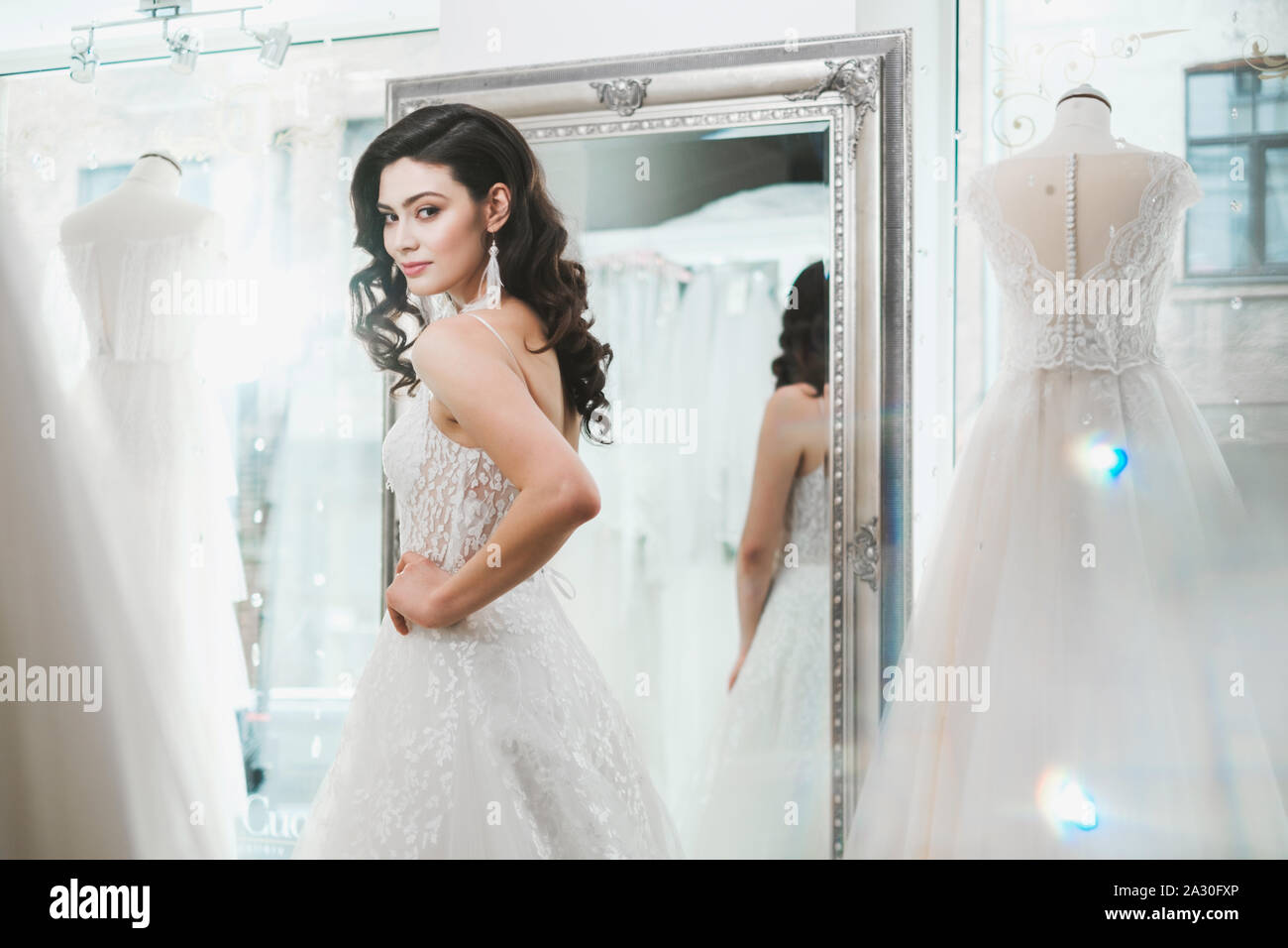Beautiful girl choosing wedding hi-res stock photography and images - Alamy