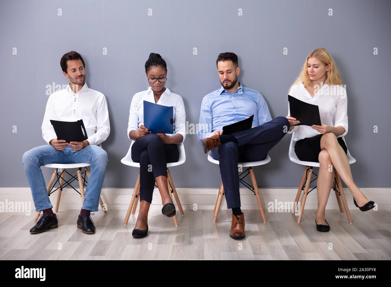 Job interview waiting man woman hi-res stock photography and images - Alamy