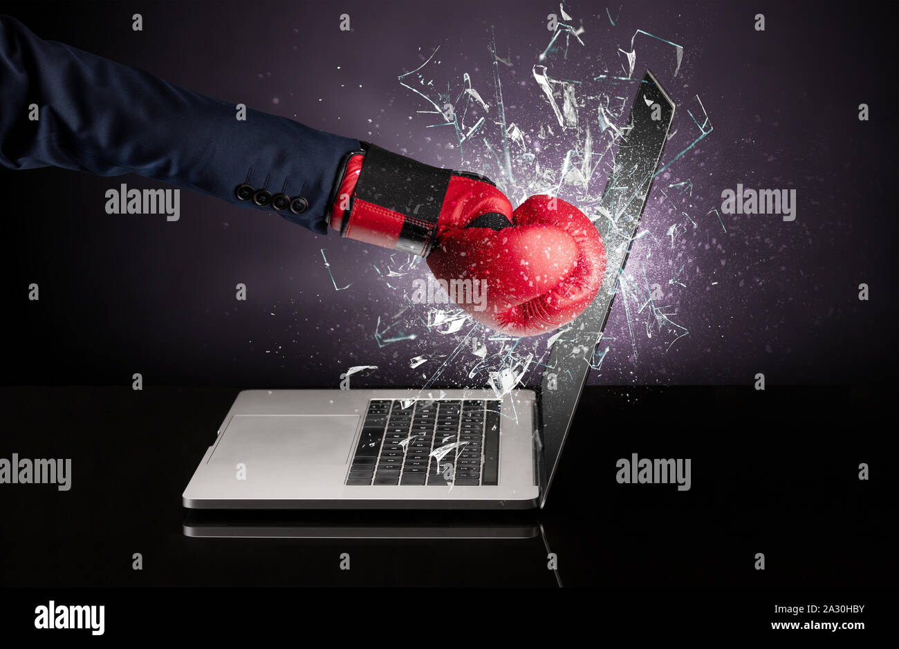 Hand hitting strongly laptop screen glass Stock Photo - Alamy