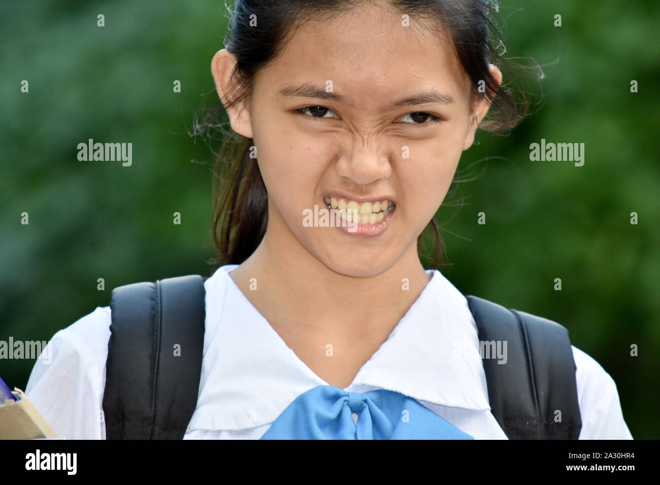 Upset Student Teenager School Girl With School Books Stock Photo - Alamy
