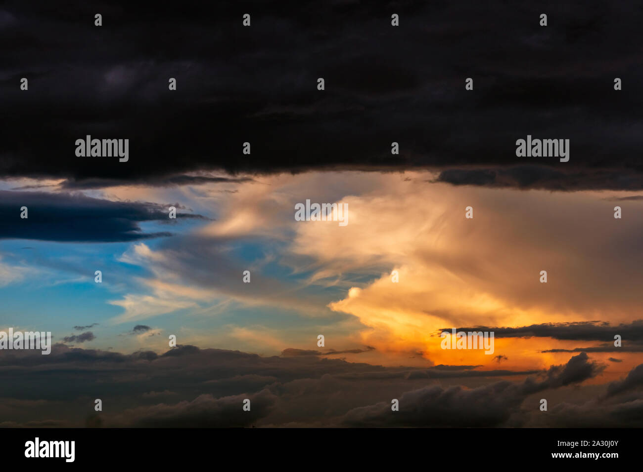 Beautiful sunset sky. Orange, blue, and white sky. Colorful sunset. Art ...