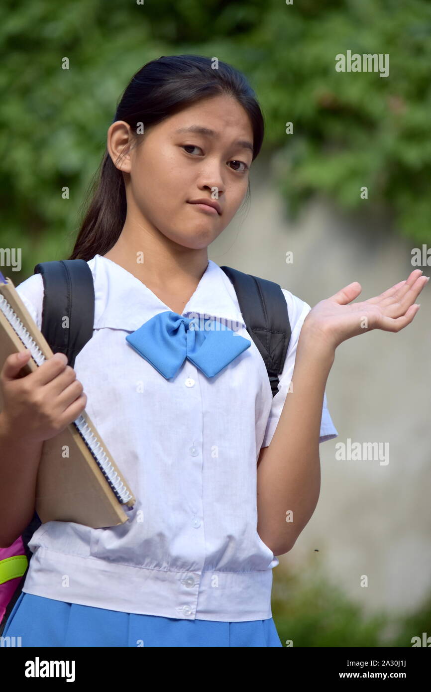 Young Asian Female Student Making A Decision Stock Photo - Alamy