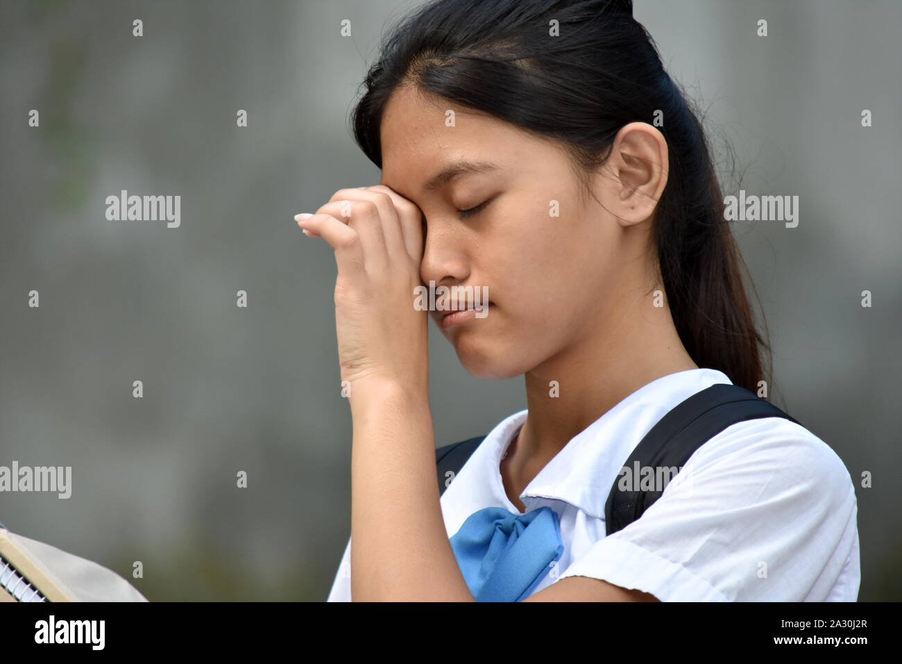 An A Crying Beautiful Filipina Person Stock Photo - Alamy