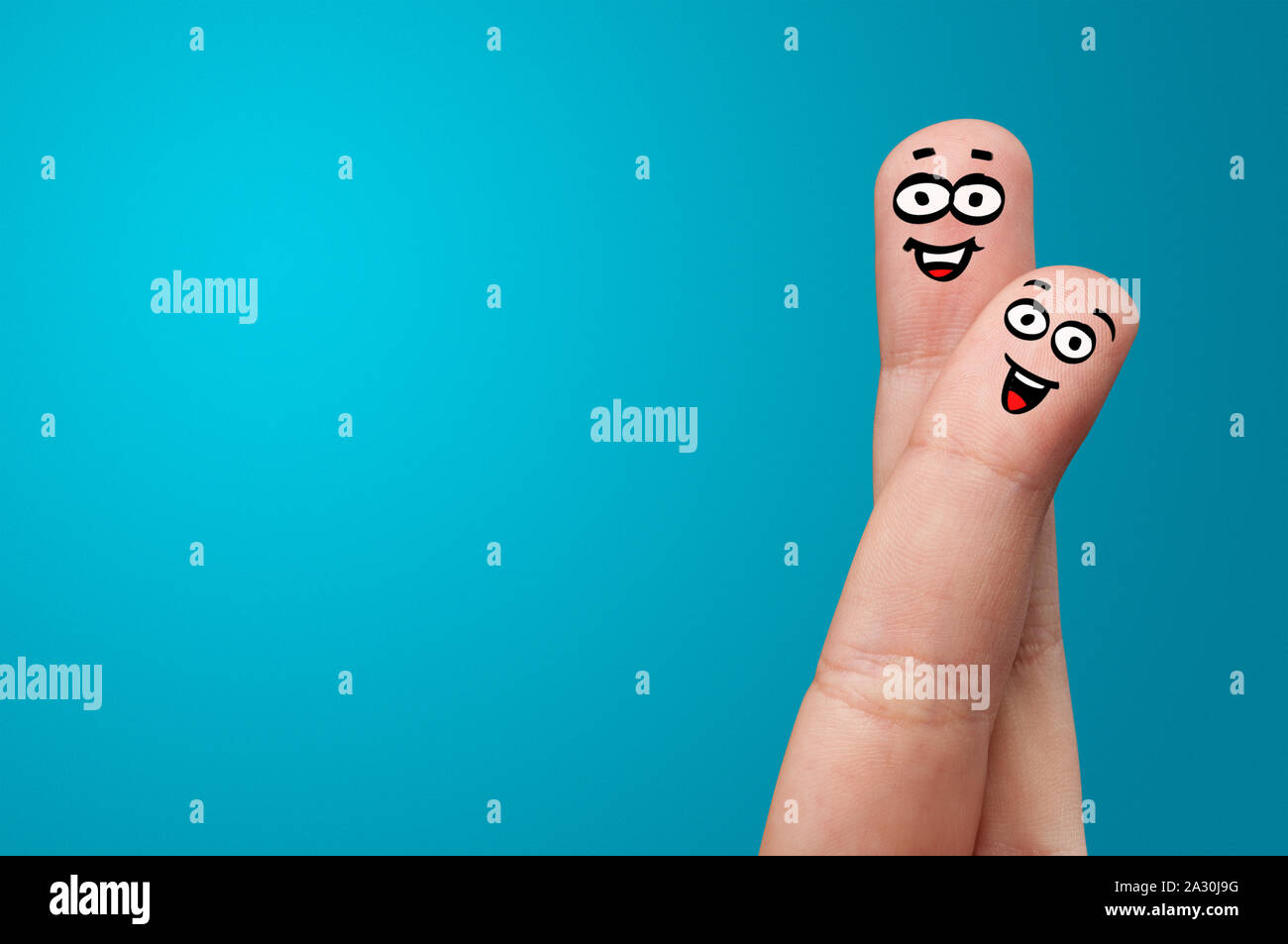 Happy face fingers hug each other Stock Photo - Alamy