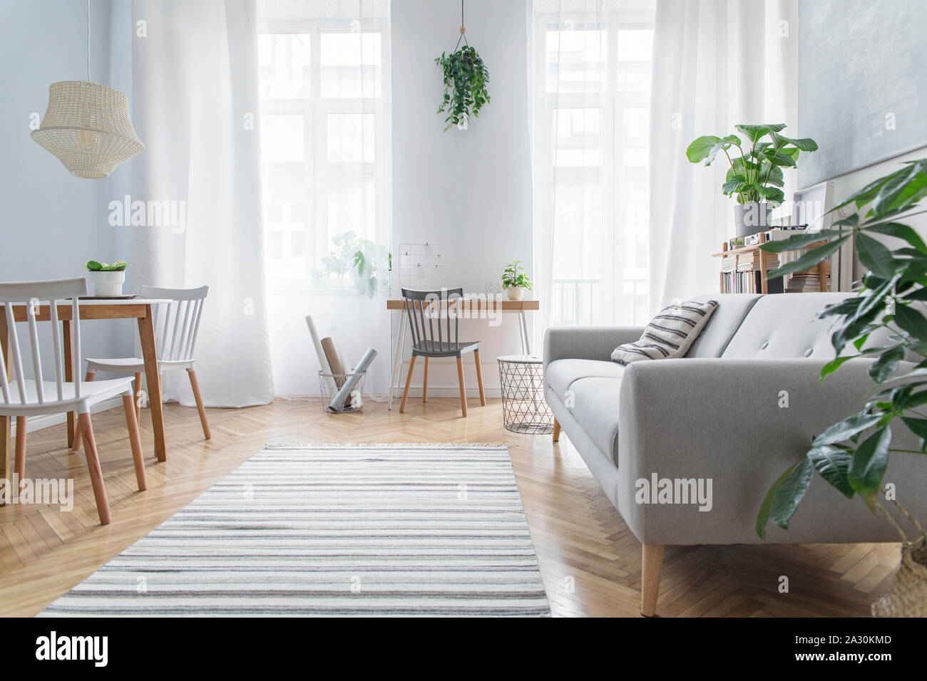 Stylish interior design of open space at nice apartment Stock Photo - Alamy