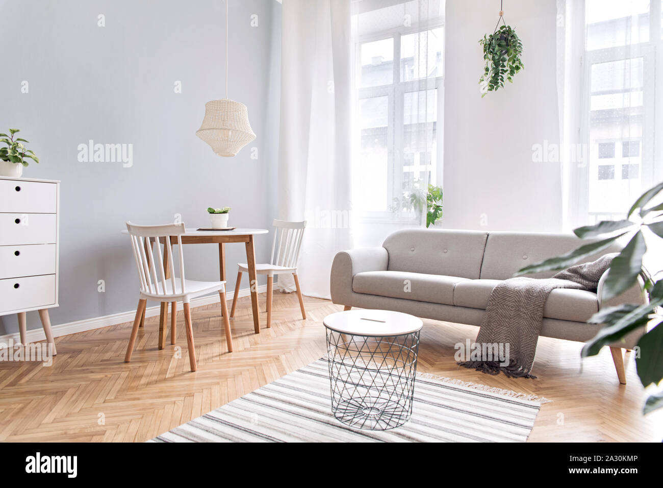 Stylish interior design of open space at nice apartment Stock Photo - Alamy