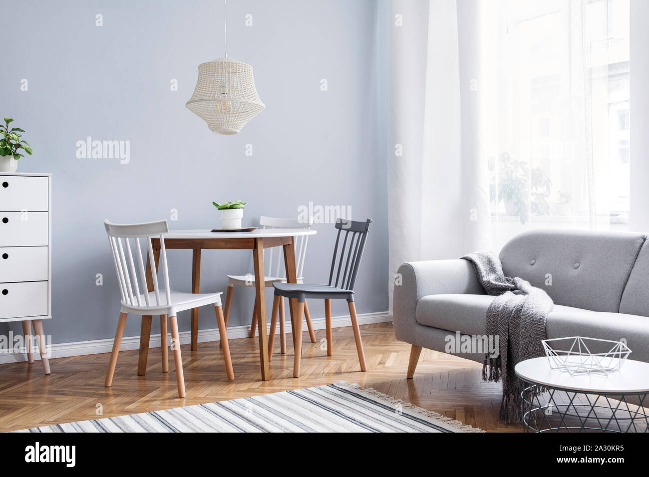 Stylish interior design of open space at nice apartment Stock Photo - Alamy