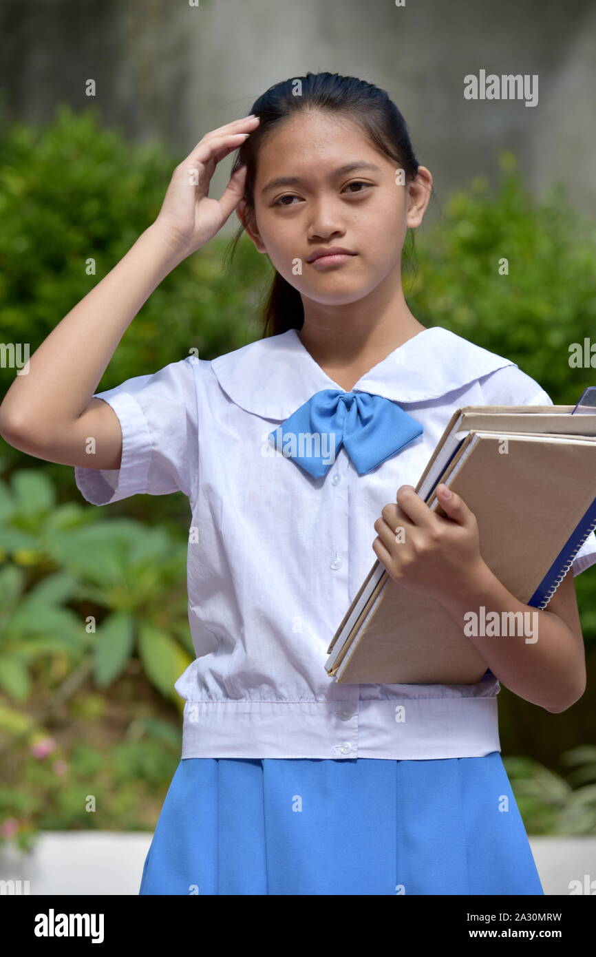 A Girl Student And Confusion Stock Photo - Alamy