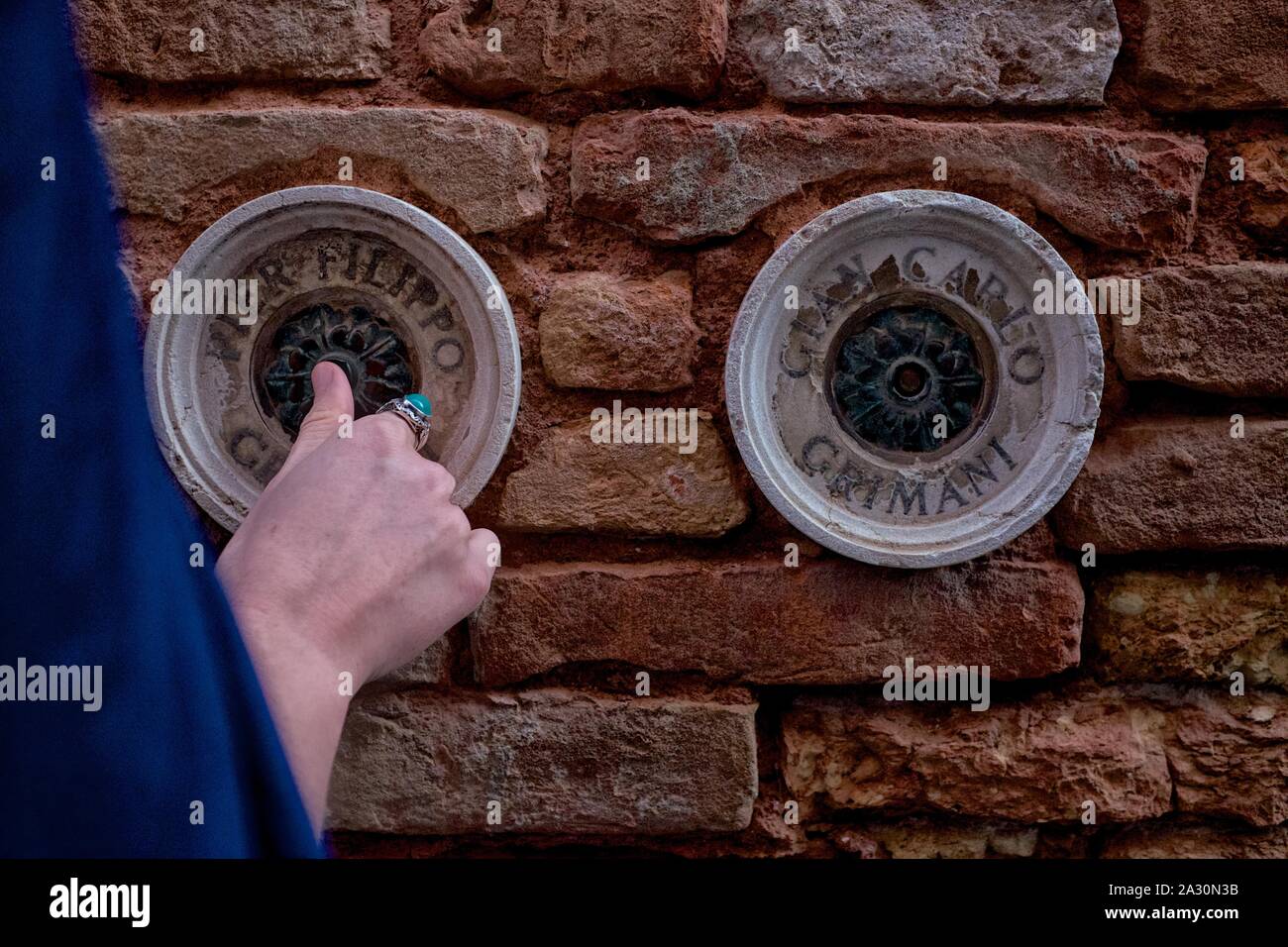 Hand ring the bell Stock Photo - Alamy