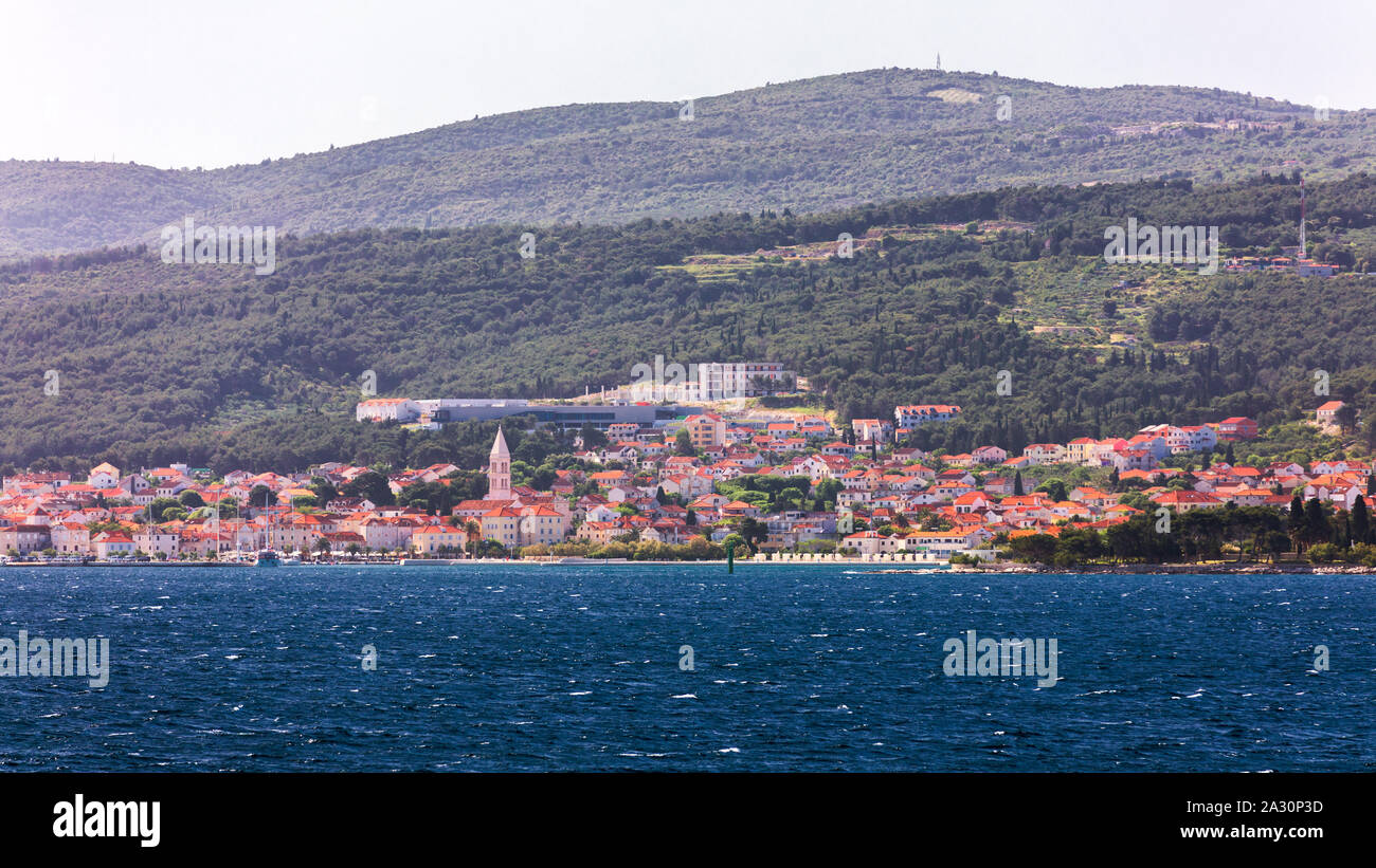 Supetar city in Brac island, Croatia. View from the sea. Picturesque ...