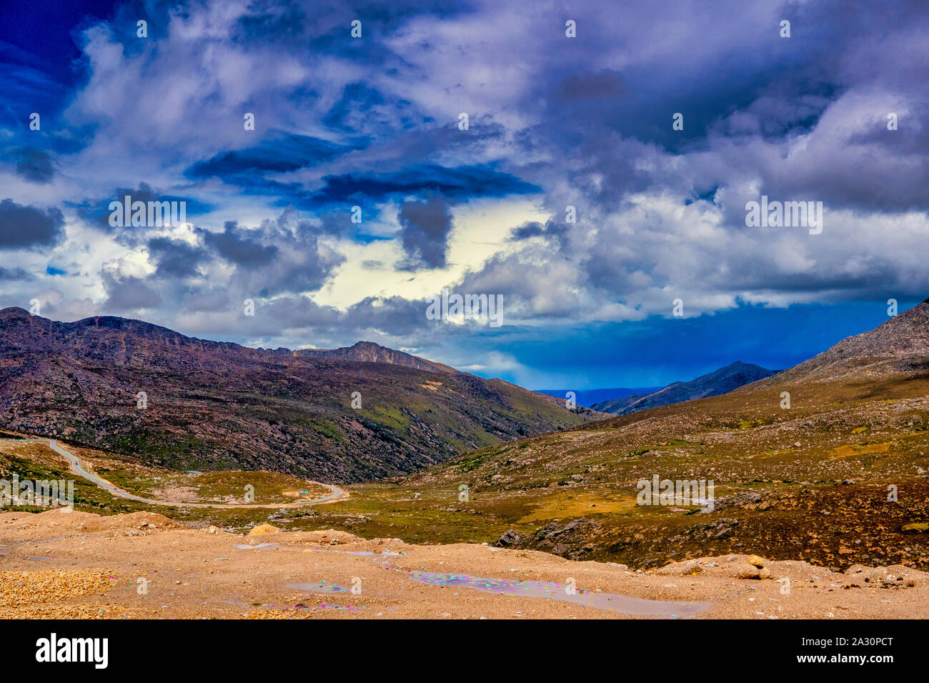 Mountains against dramatic clouds in the afternoon during autumn in ...