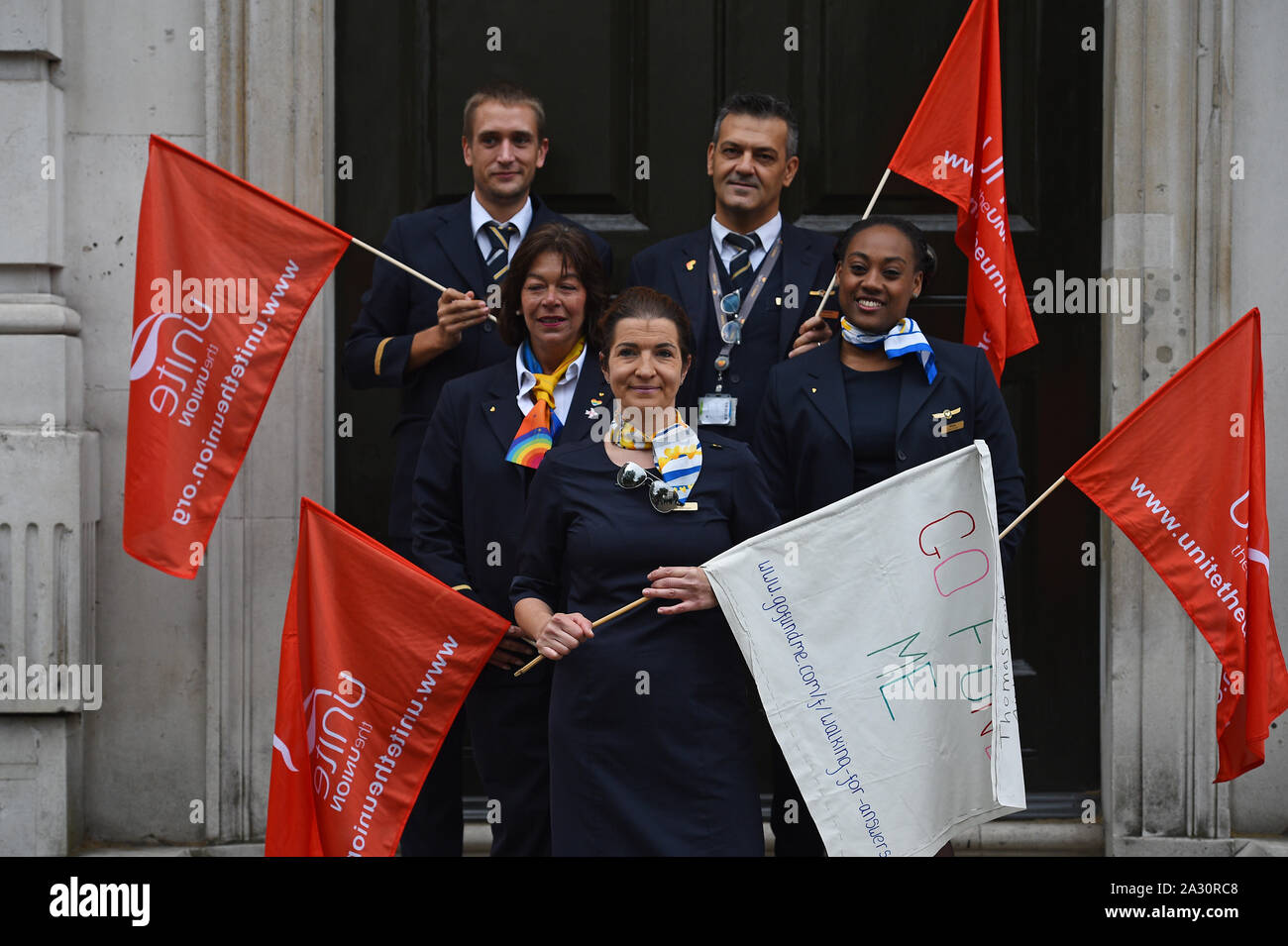 Ex-Thomas Cook cabin crew member Rachel Murrell waves flags with former ...