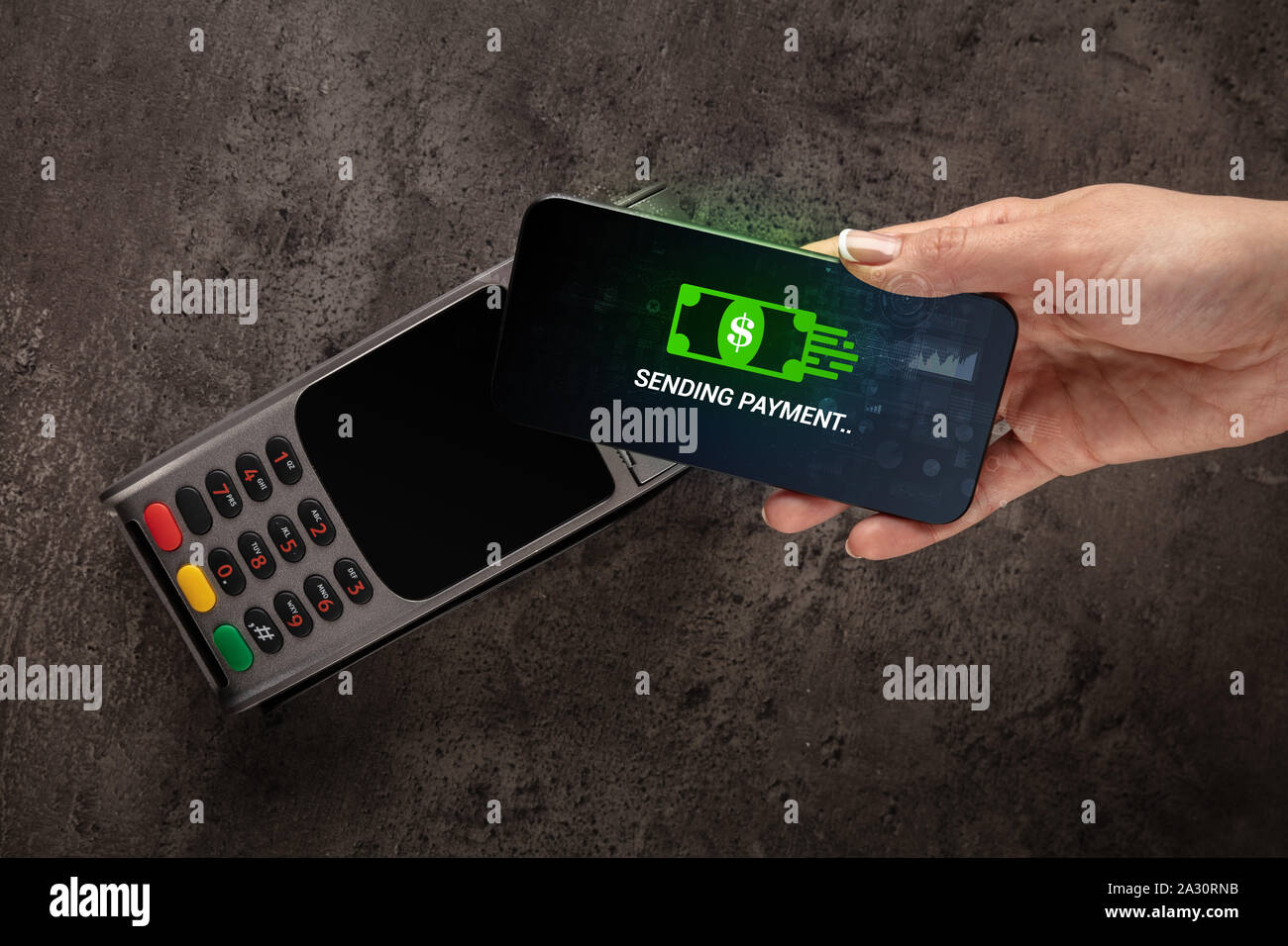 Hand paying with digital currency from smartphone Stock Photo - Alamy