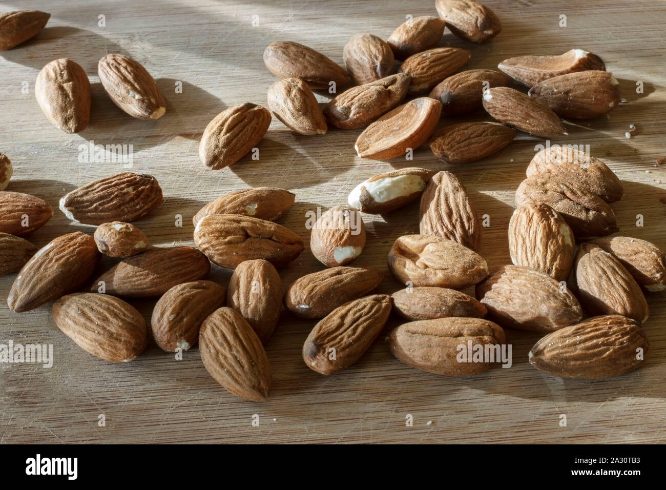 Almonds on table hi-res stock photography and images - Alamy