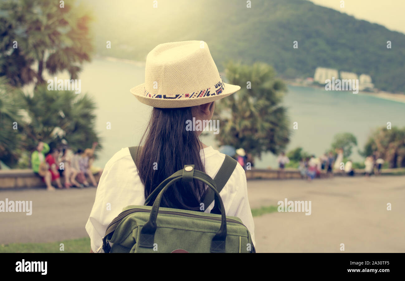 Girl with backpack viewing to the sea during sunset in phuket Stock ...