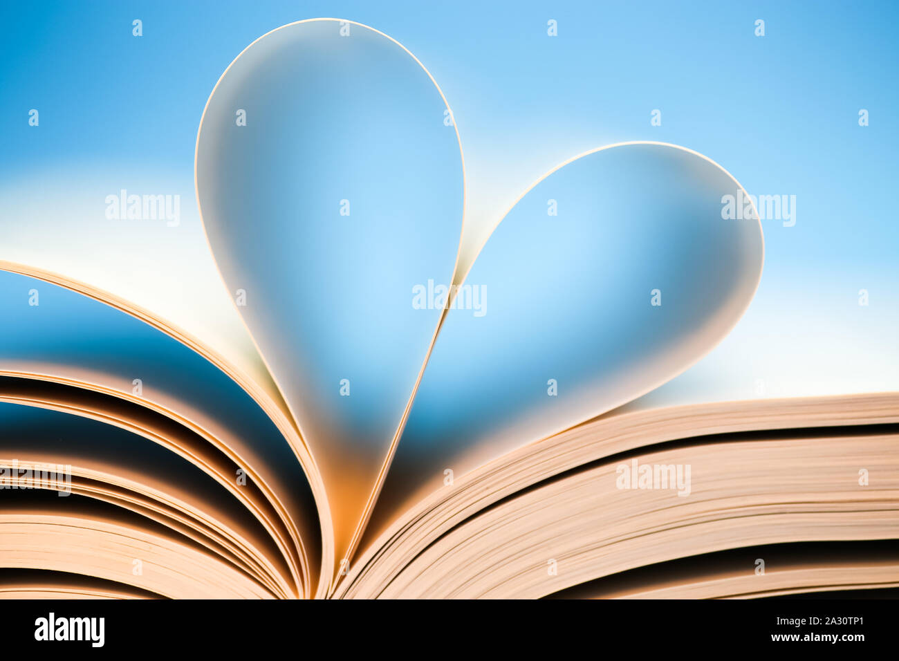 Open book blue background hi-res stock photography and images - Alamy