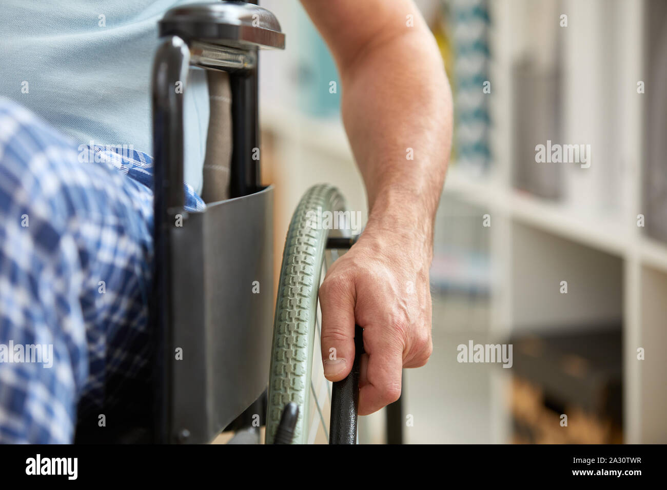 Patient riding in wheelchair hi-res stock photography and images - Alamy