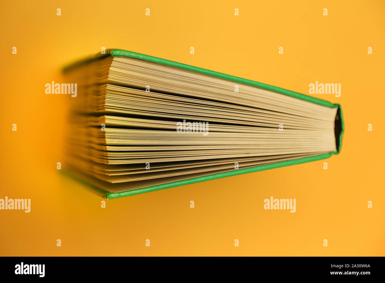Yellow background, bright book top down. Literature pages spread ...