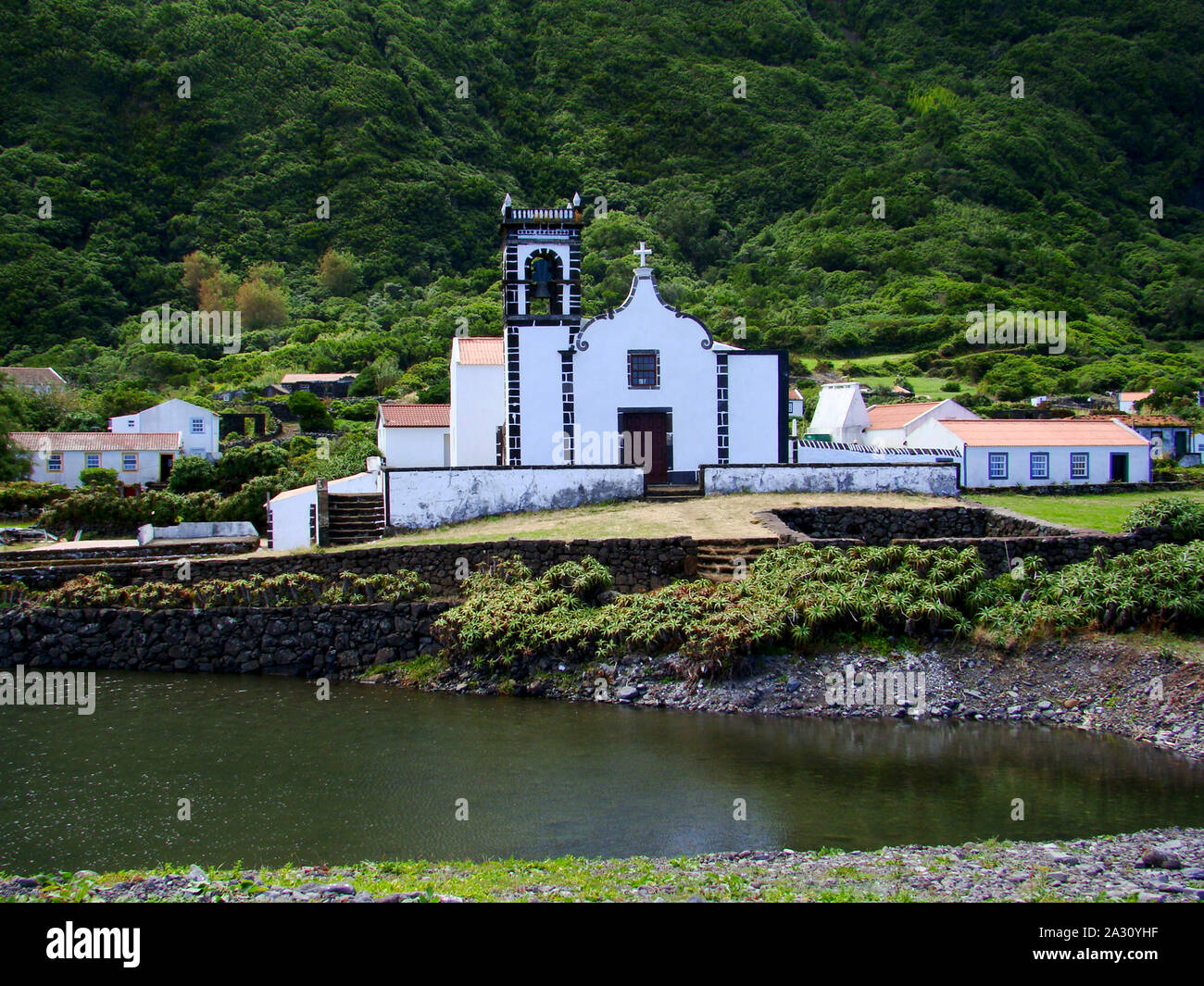 Coastal lagoons and steep sea cliffs in Sao Jorge island, Azores ...