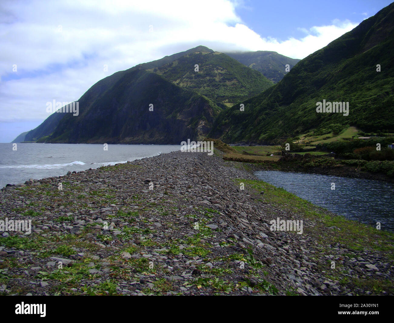 Coastal lagoons and steep sea cliffs in Sao Jorge island, Azores ...
