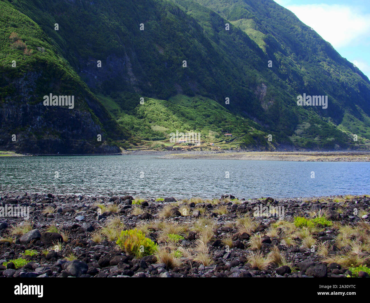Coastal lagoons and steep sea cliffs in Sao Jorge island, Azores ...