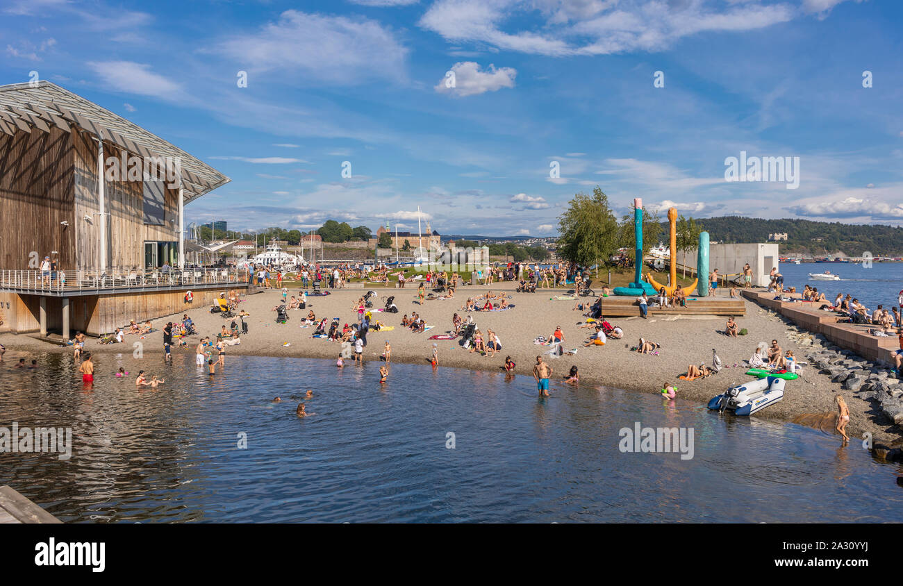 OSLO, NORWAY - People sunbathing and swimming at Filipstad, Oslo ...