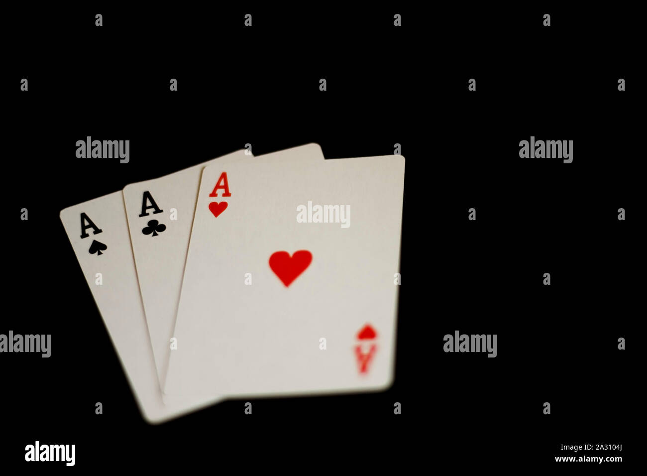Set of aces on black background Stock Photo - Alamy