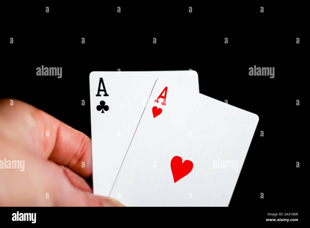 Two aces in a hand Stock Photo - Alamy