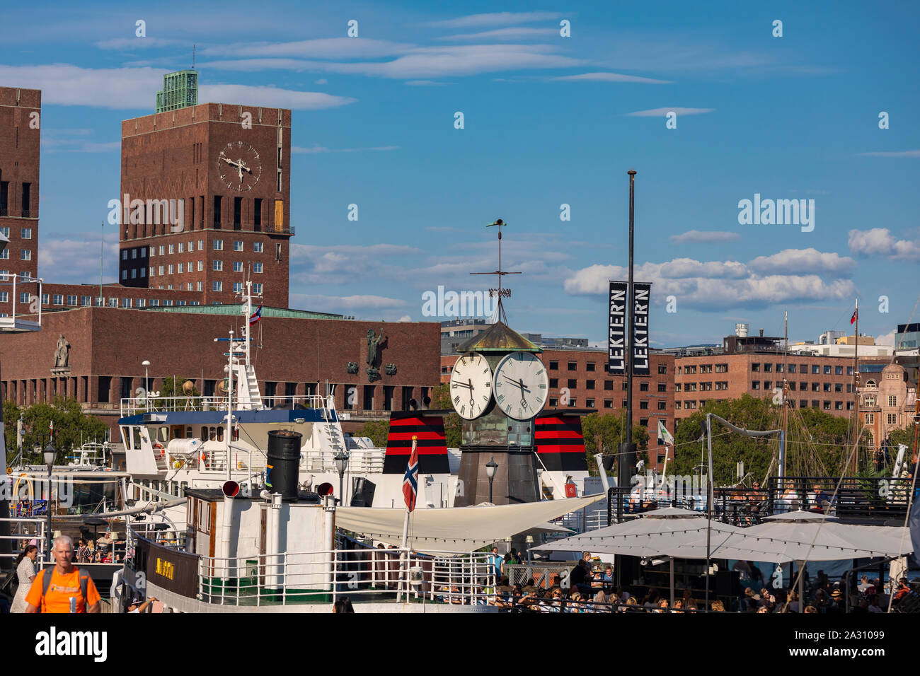 OSLO, NORWAY - Clock tower on waterfront. City Hall, left rear Stock ...