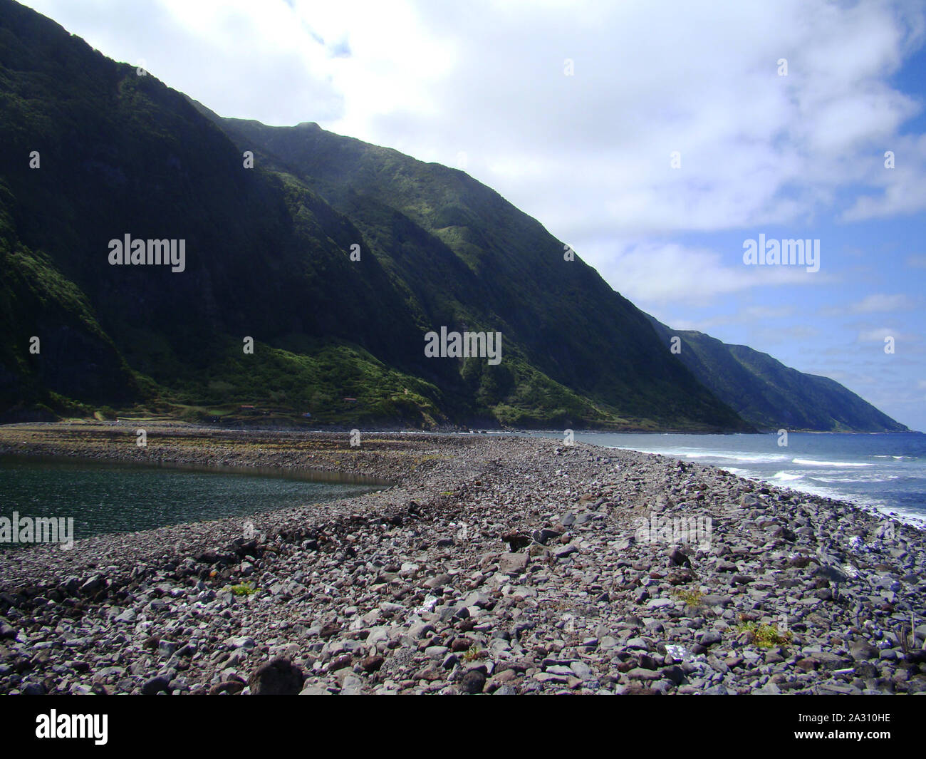 Coastal lagoons and steep sea cliffs in Sao Jorge island, Azores ...