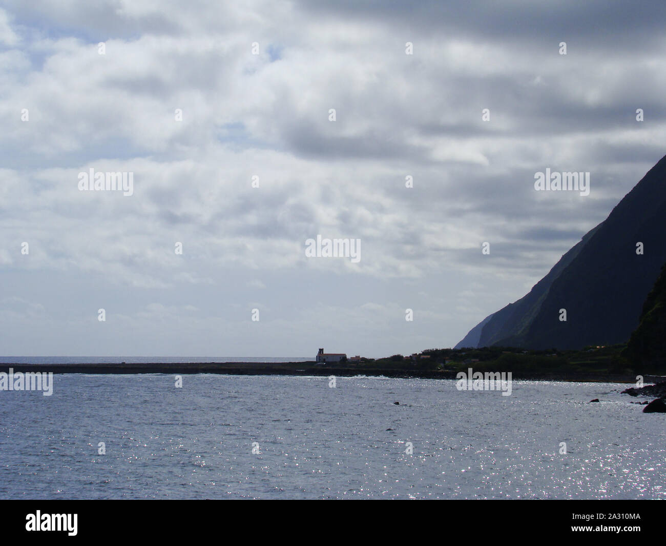 Coastal lagoons and steep sea cliffs in Sao Jorge island, Azores ...