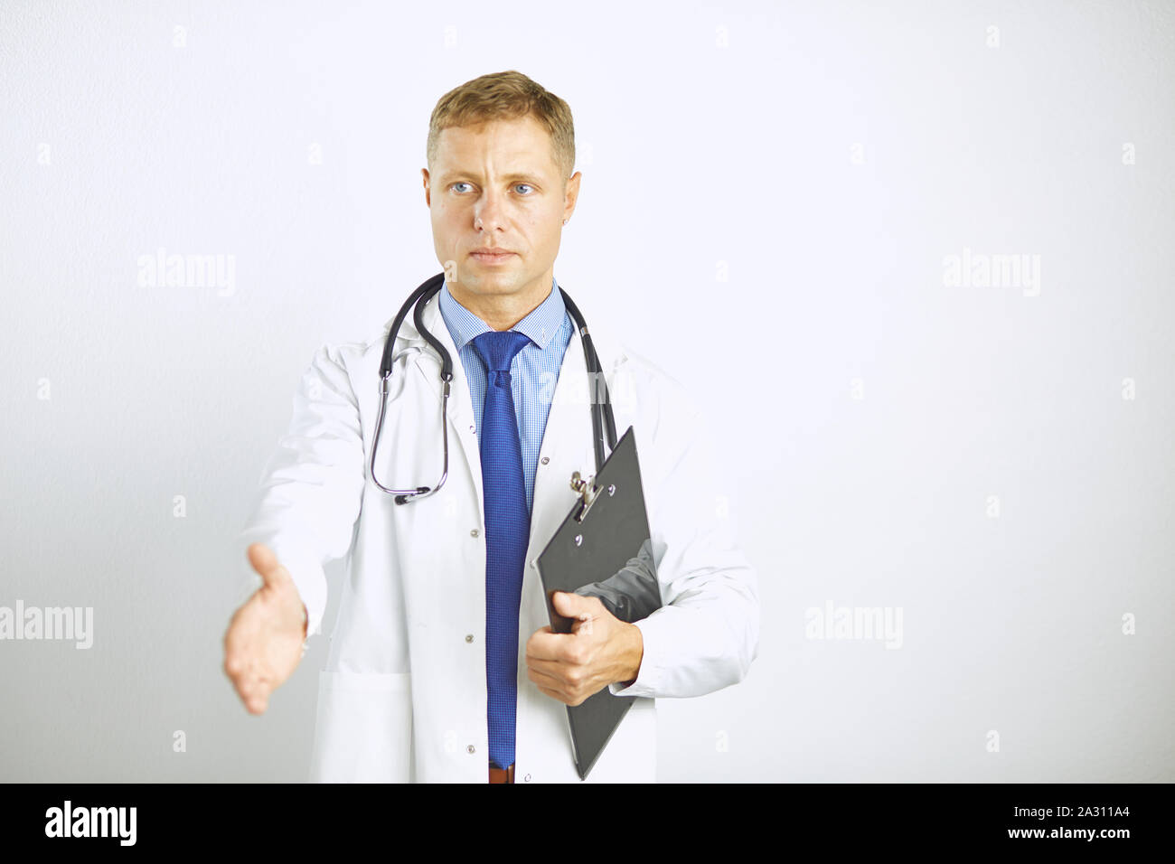 Man holding out hand shake hi-res stock photography and images - Alamy