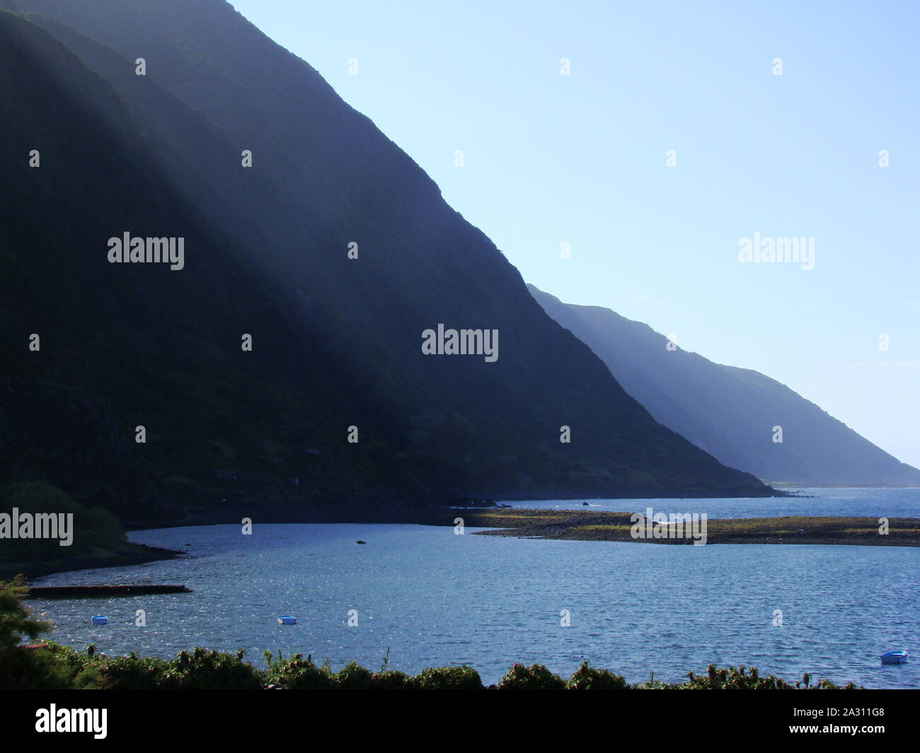 Coastal lagoons and steep sea cliffs in Sao Jorge island, Azores ...